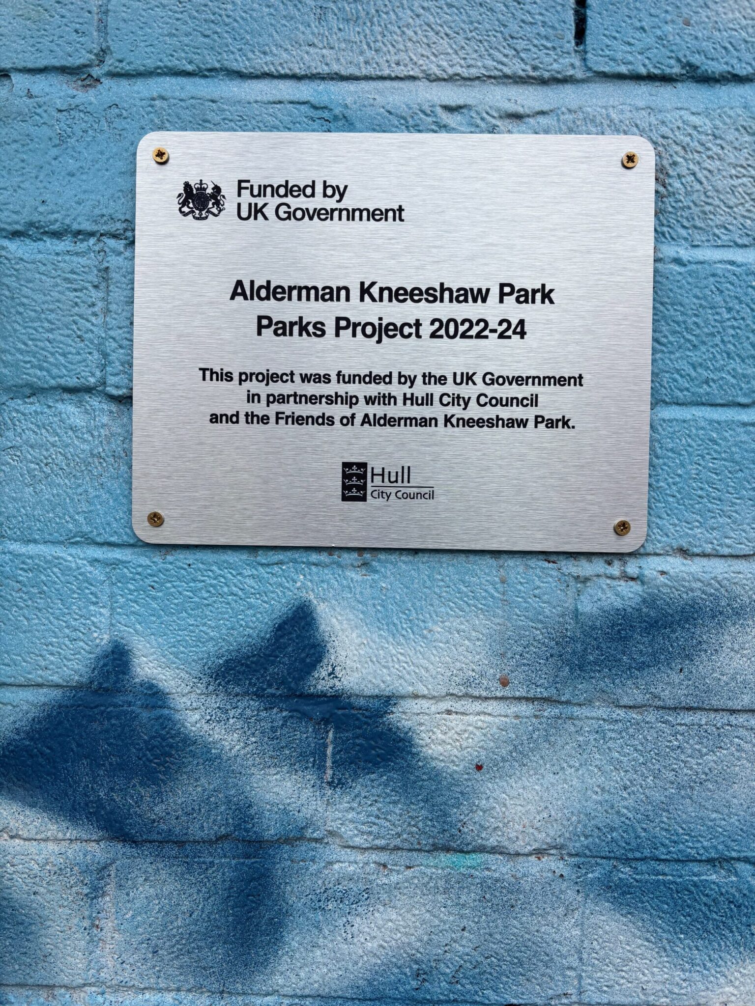 Plaque signifies completion of Alderman Kneeshaw Park improvement ...